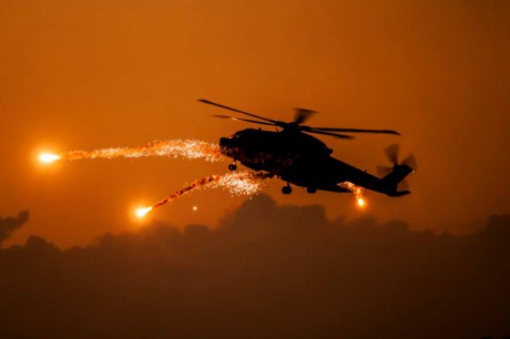 Helicopter creates rain of flares at dusk to fight winter depression in ...