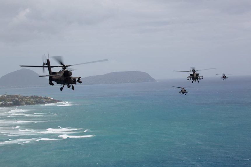 Cool shots show AH-64D Apache Longbow Attack Helicopters flying over ...
