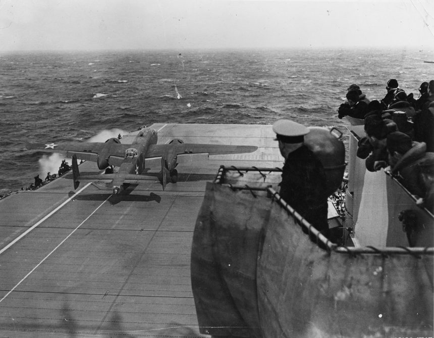 Check Out This Photo of Capt. Marc Mitscher Holding the Orders for the ...